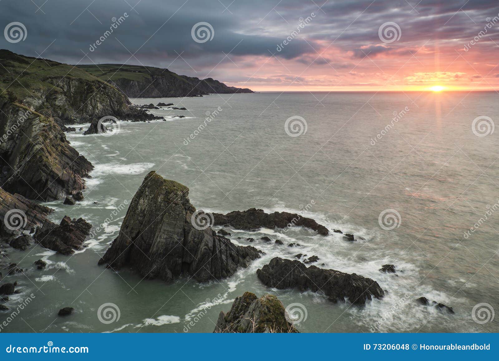 Dramatic Stormy Sunrise Landscape Over Bull Point in Devon England ...