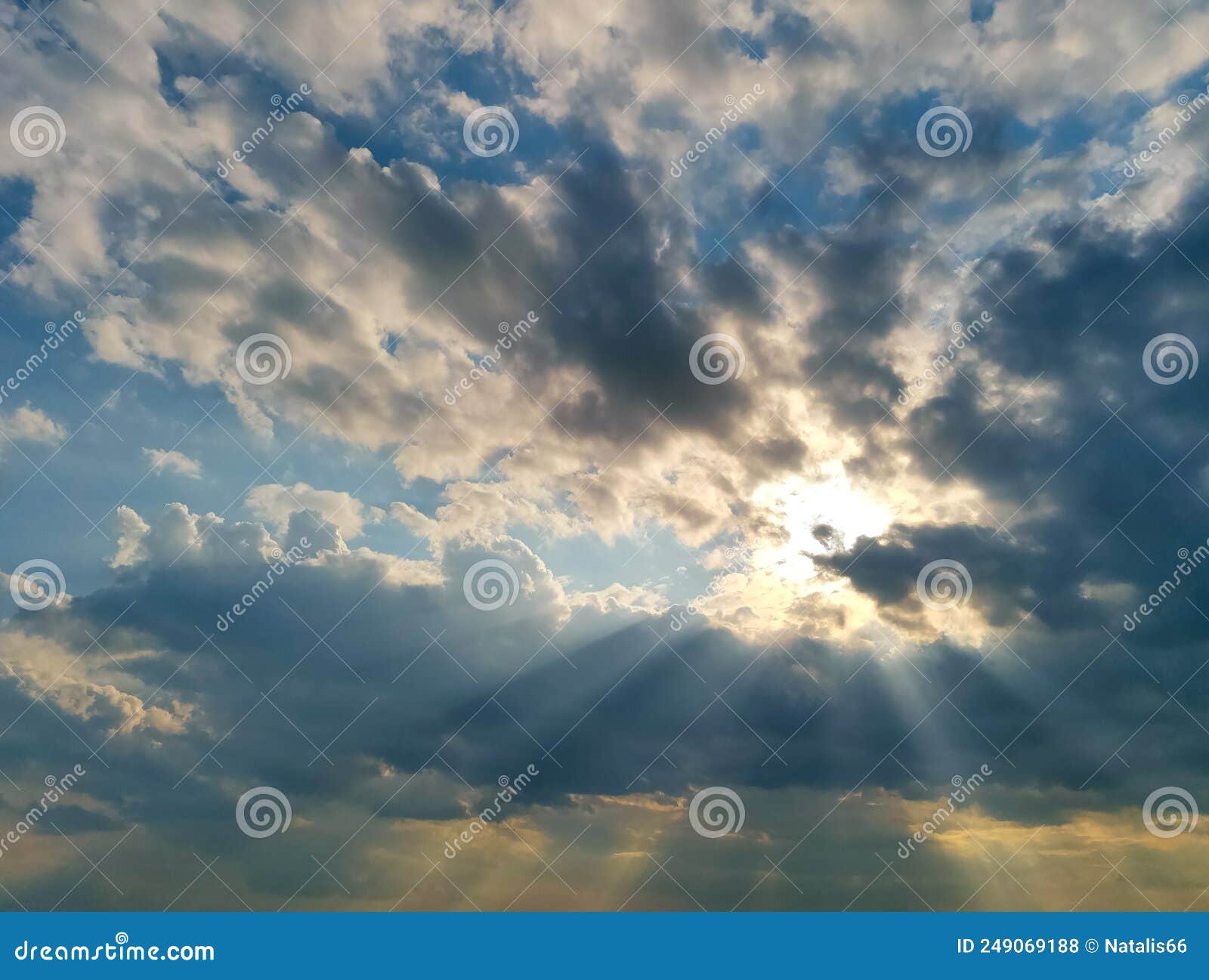 Dramatic Stormy Sunset Sky with Sun Rays Breaking through Gloomy Clouds ...