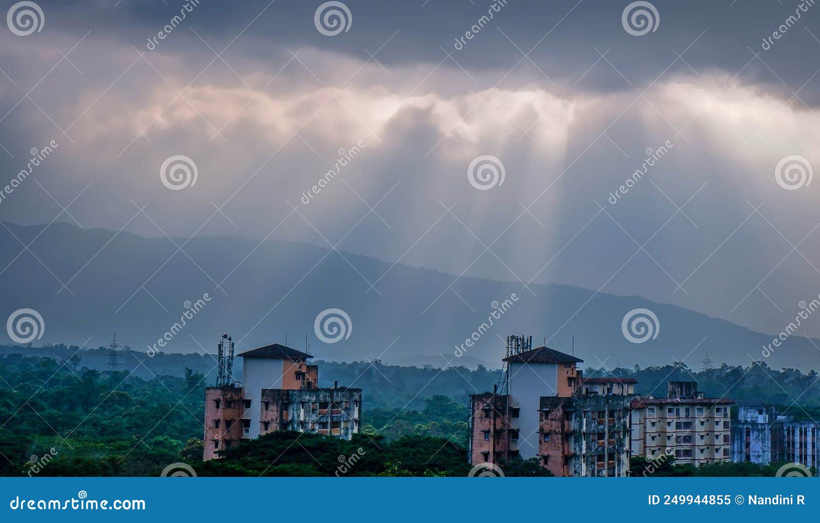 Dramatic Sun Rays Falling on the Buildings Stock Image - Image of ...