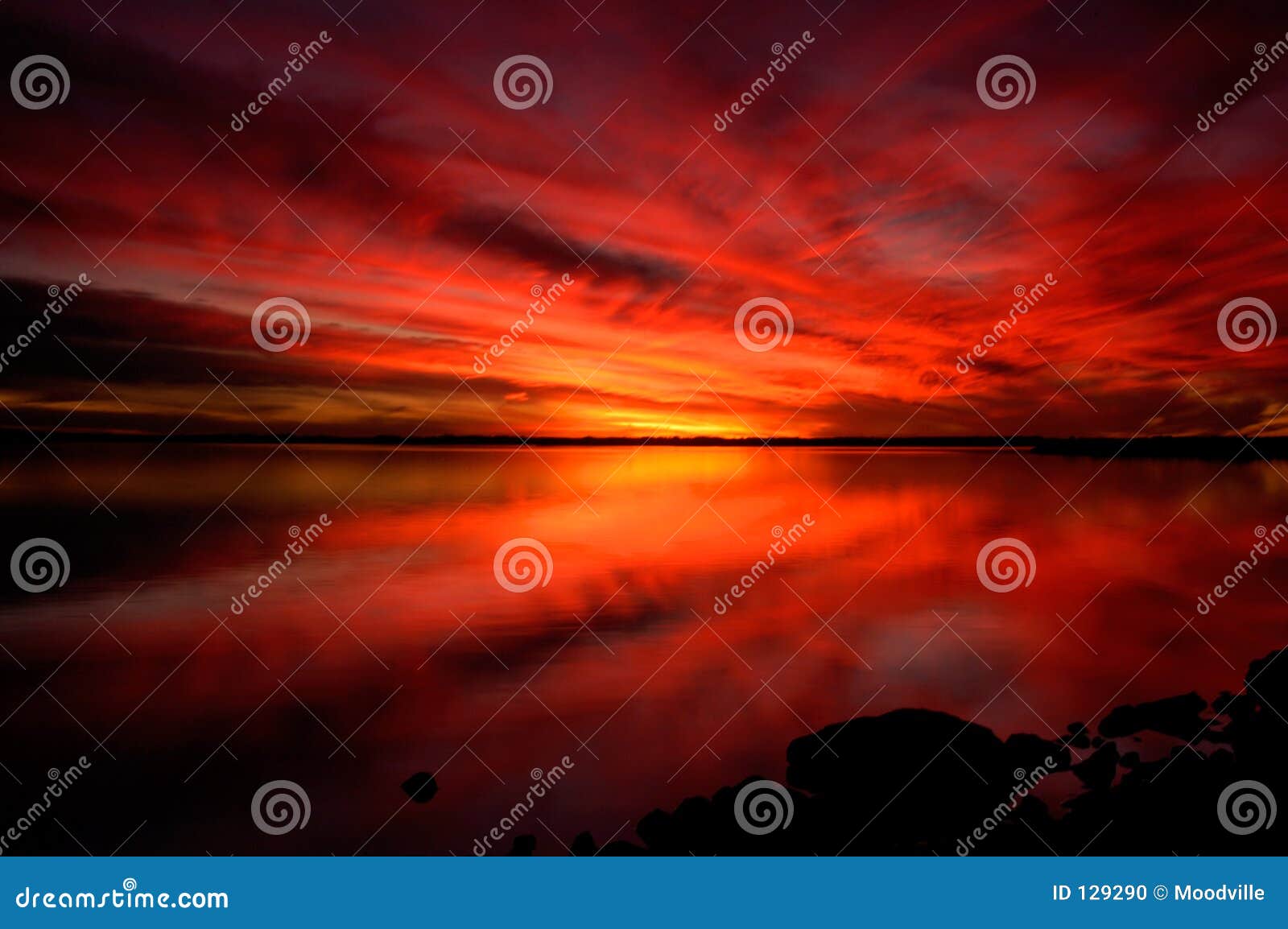 Dramatic sunset stock photo. Image of waterscape, sunrise - 129290
