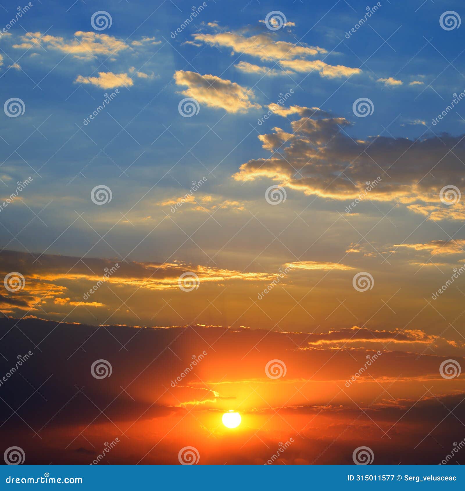 Dramatic Sunset Background with Bright Sun, Blue Sky and Clouds Stock ...