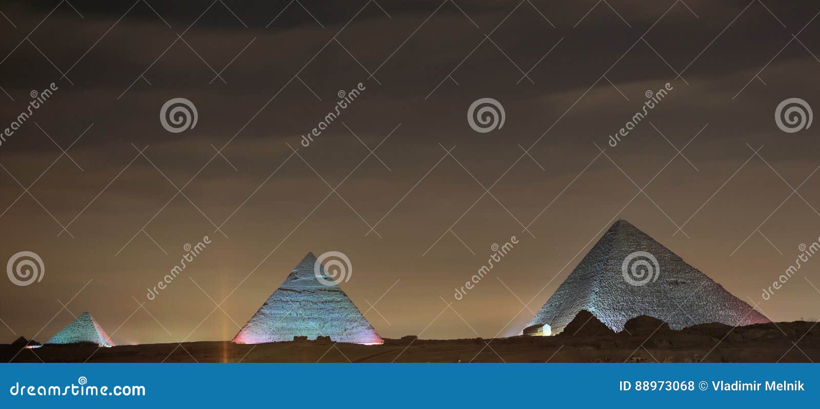Sunset Behind Distant Egyptian Pyramids Stock Photo - Image of dusk ...