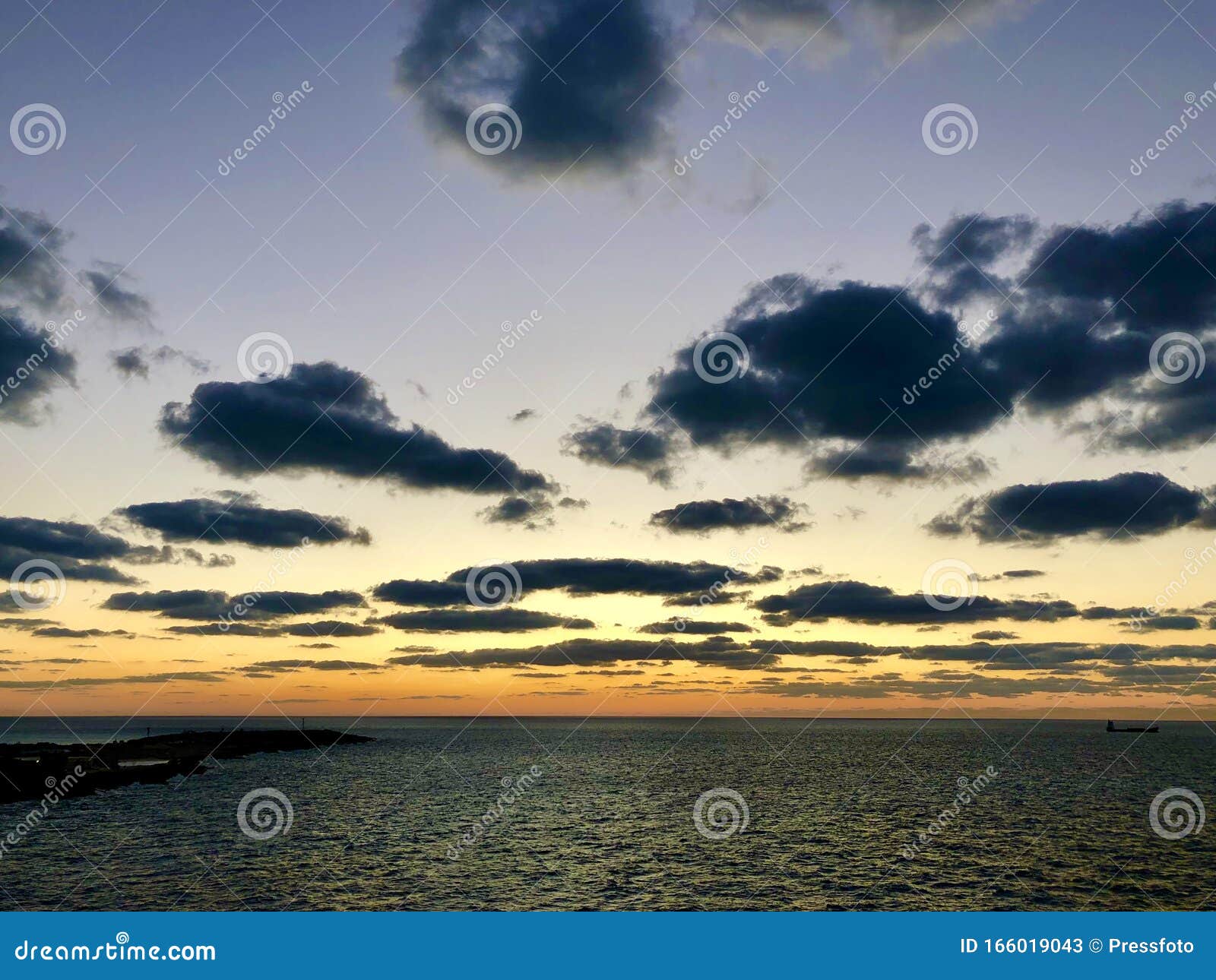 Dramatic sunset and clouds stock image. Image of blue - 166019043