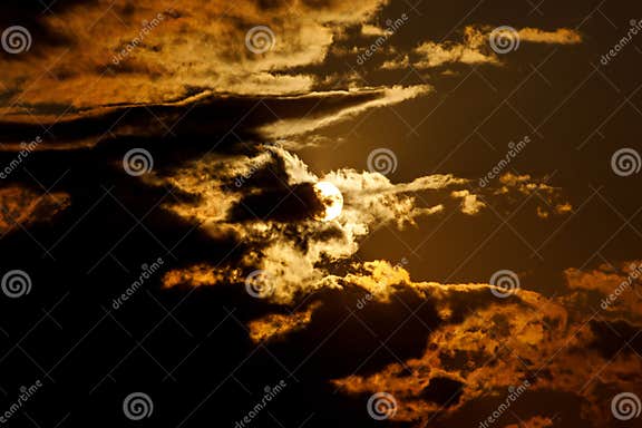 Dramatic Sunset with Clouds. the Round Sun Sits Down Stock Photo ...