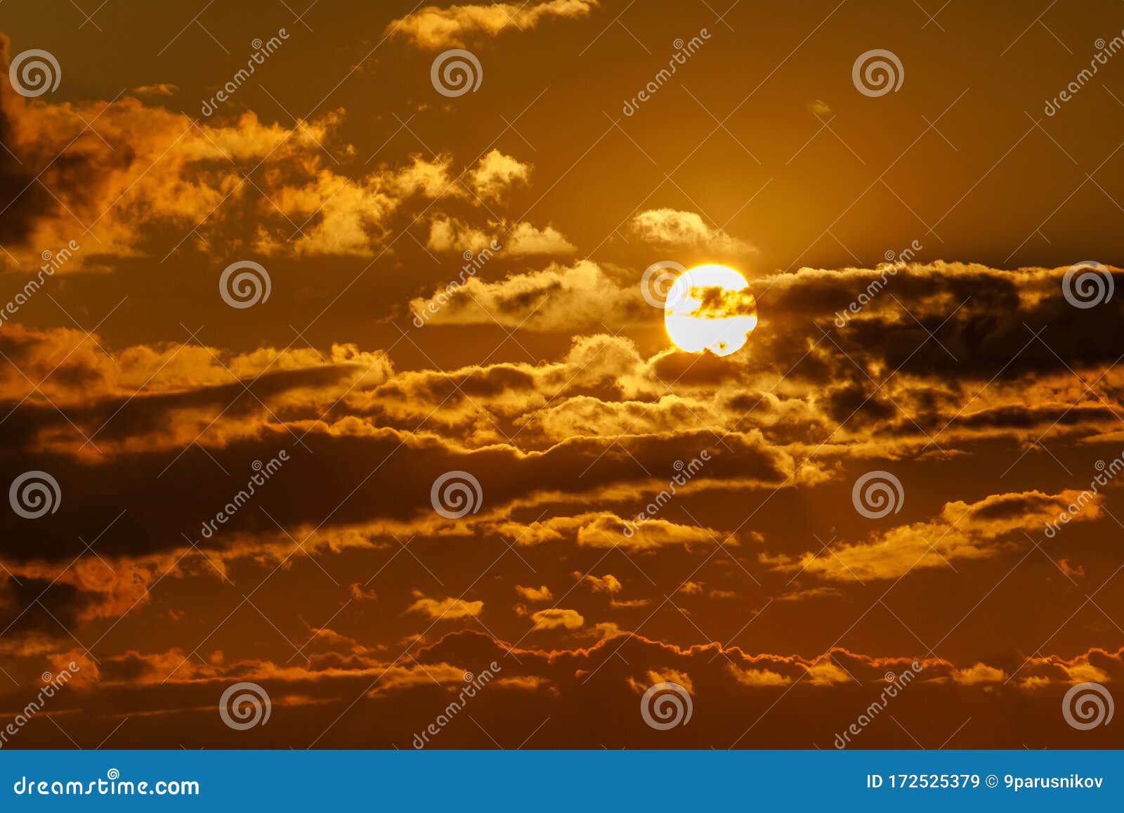 Dramatic Sunset with Clouds. the Round Sun Sits Down Stock Image ...