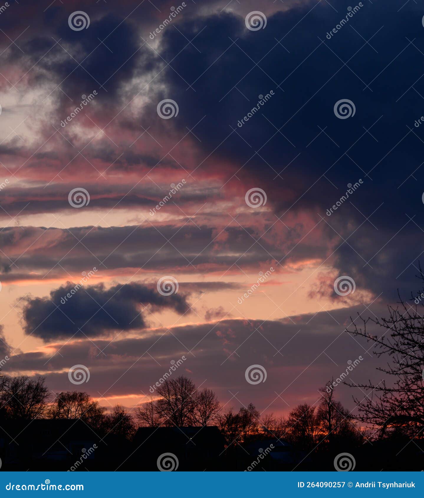 Dramatic Sunset with Dark Clouds and Glimpses of Light. Stock Image ...