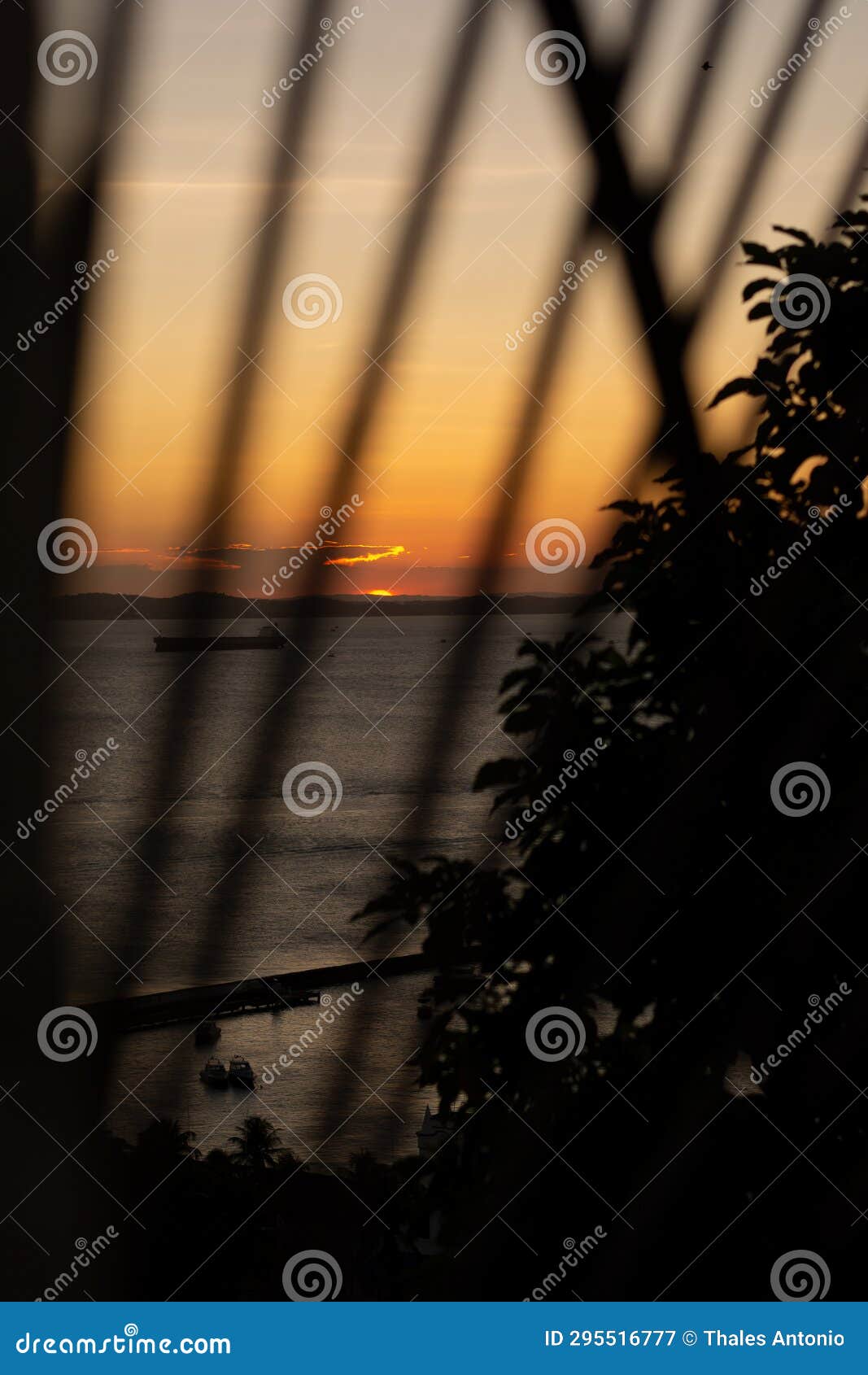 Dramatic Sunset through Iron Railings Stock Image - Image of island ...