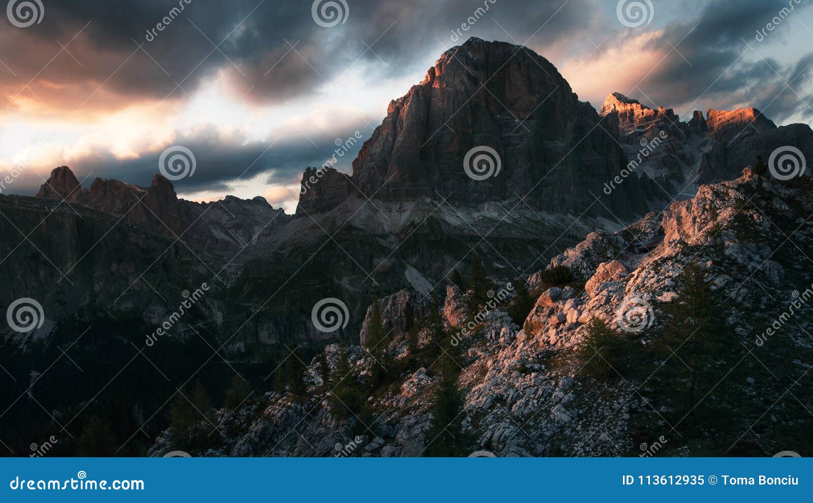 Dramatic Sunset in the Mountains with Dark Heavy Clouds in Dolomite ...