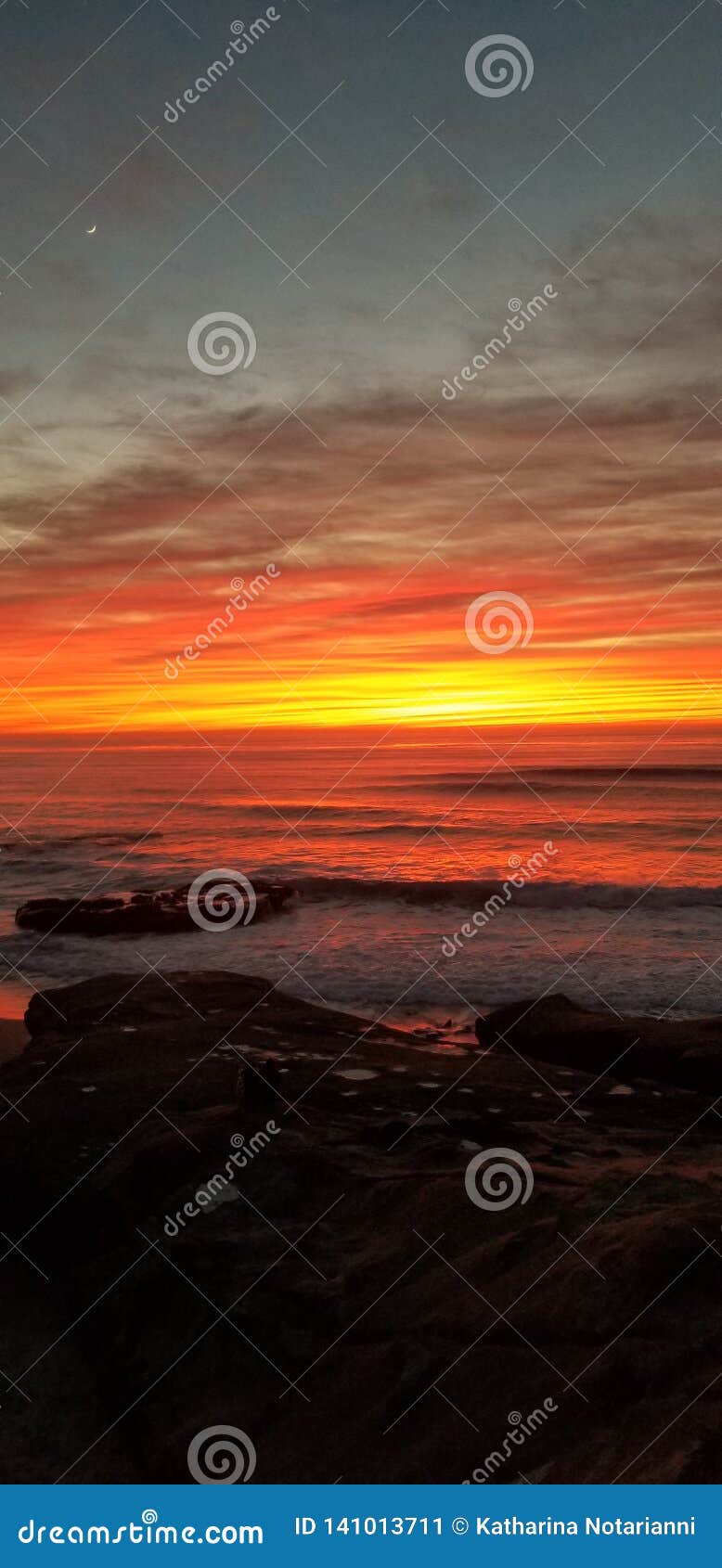 Dramatic Sunset Over Pacific Ocean - Waves Crashing on the Rocks Stock ...