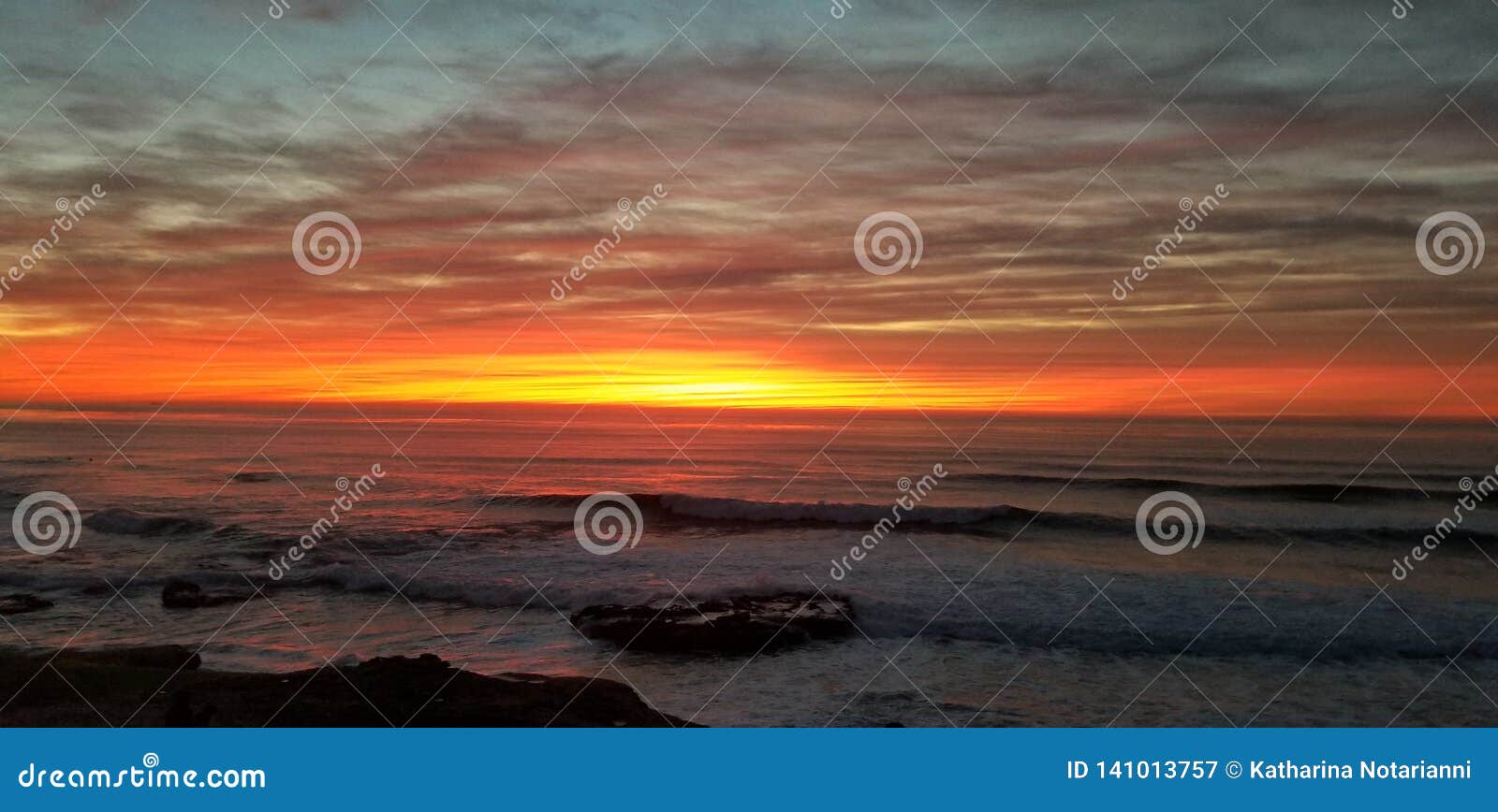 Dramatic Sunset Over Pacific Ocean - Waves Crashing on the Rocks Stock ...
