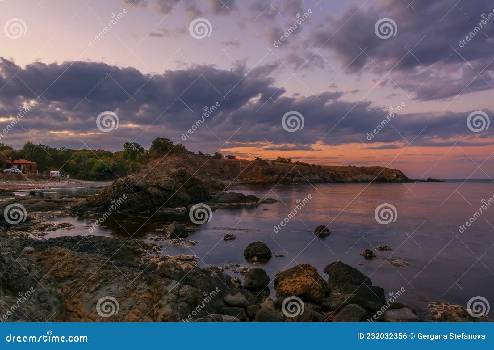 Red Sky Over a Rocky Seashore. Sunset Landscape. Stock Photo - Image of ...