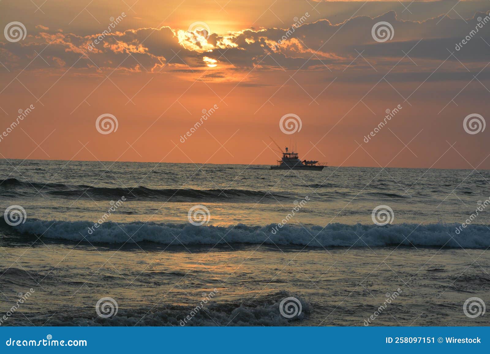 Dramatic Sunset Over the Sea and the Ship Stock Image - Image of beach ...