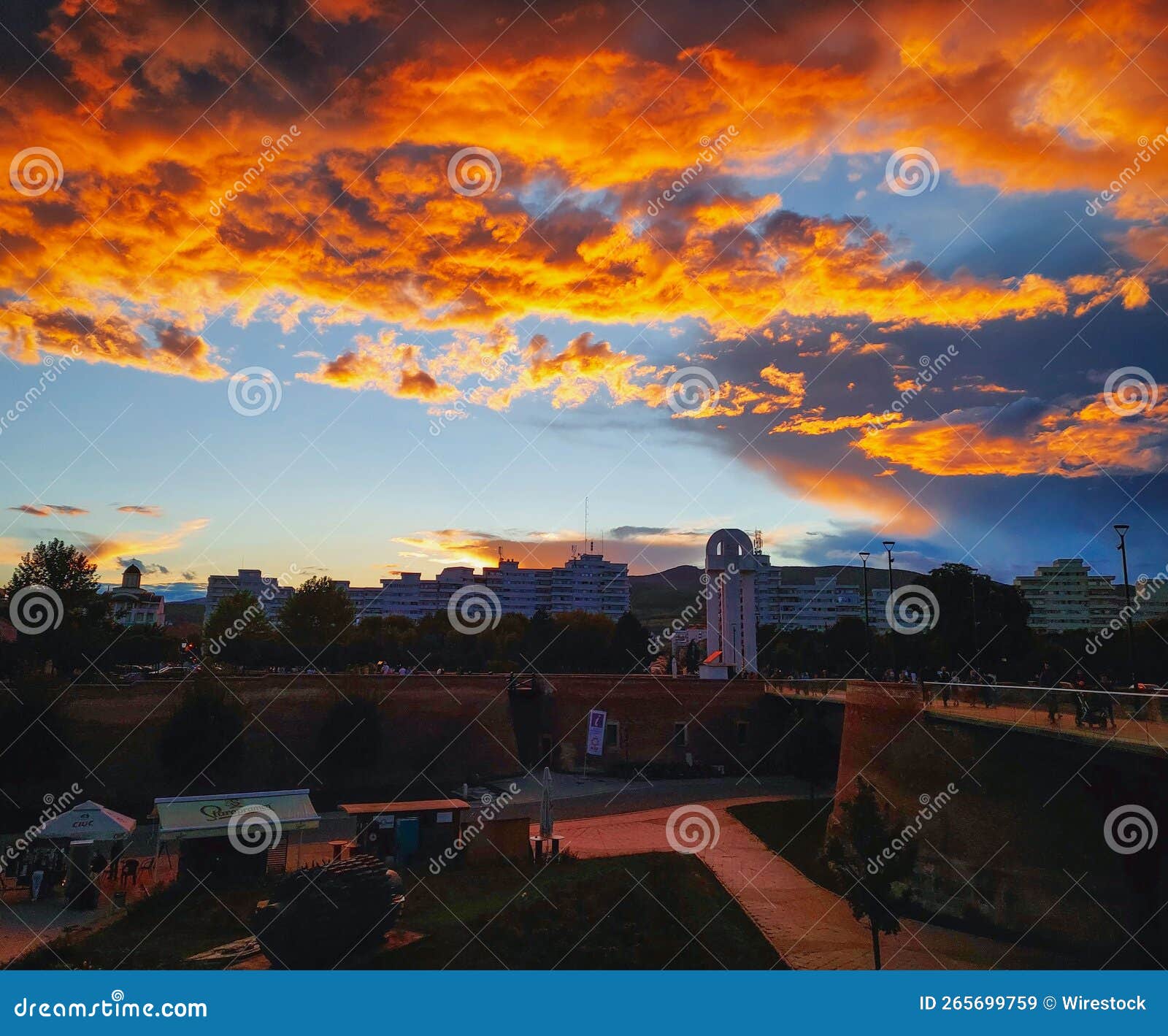 Dramatic Sunset Over a Town with White Buildings Stock Image - Image of ...