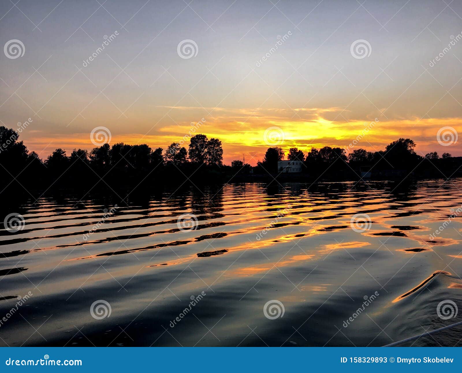 Dramatic Sunset Over the Water Stock Image - Image of lake, view: 158329893