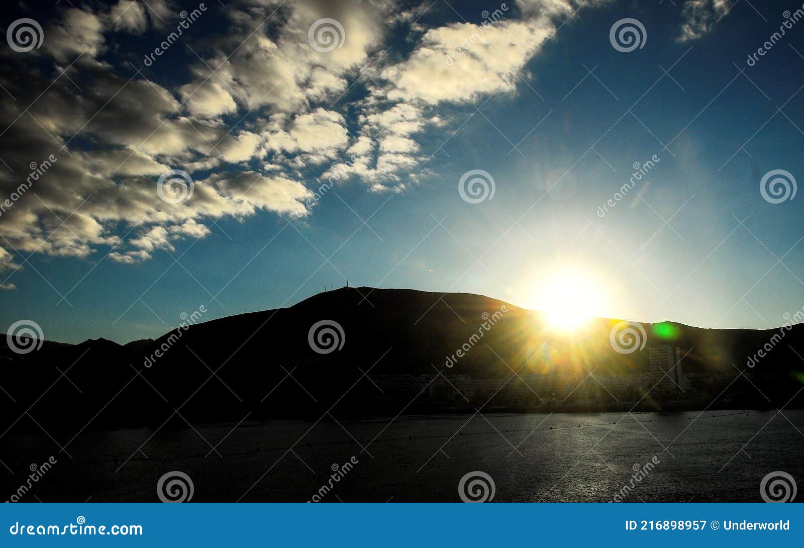 Dramatic Sunset Rays stock image. Image of mountain - 216898957