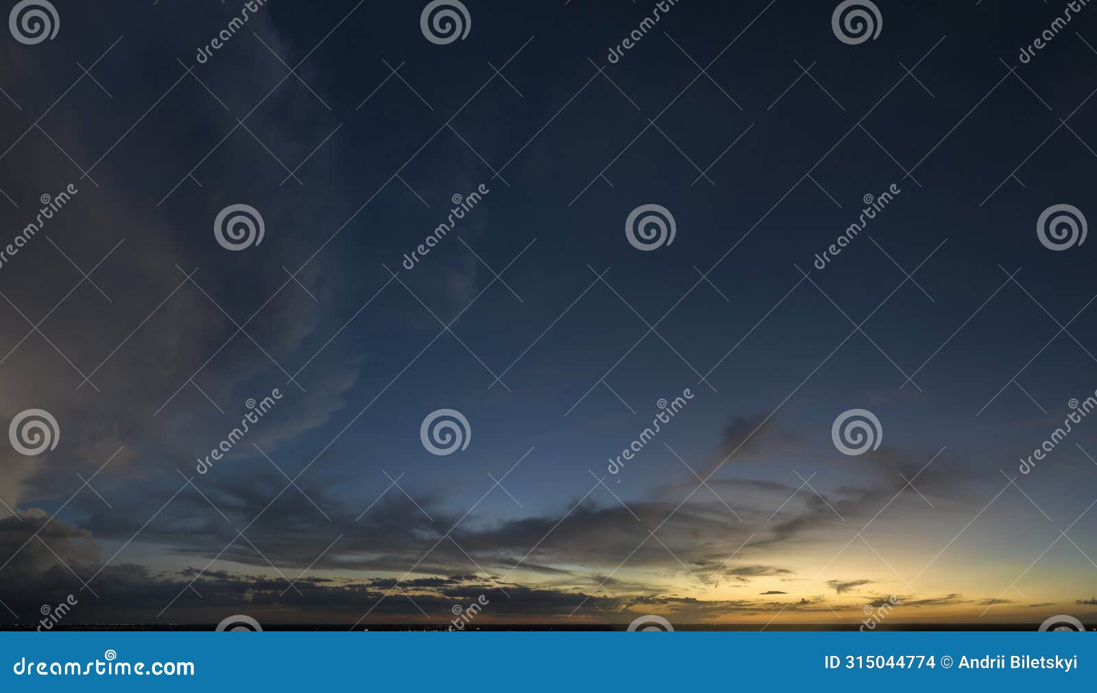Dramatic Sunset Sky Covered with Colorful Yellow Clouds. Panoramic ...