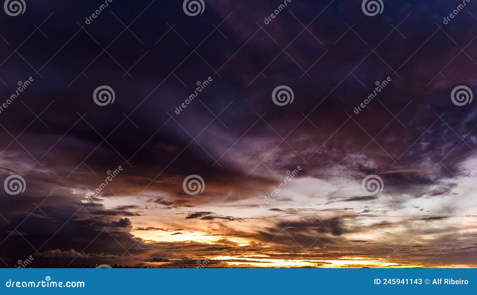 Dramatic Sunset in the Sky through Cumulus Storm Clouds, Stock Image ...