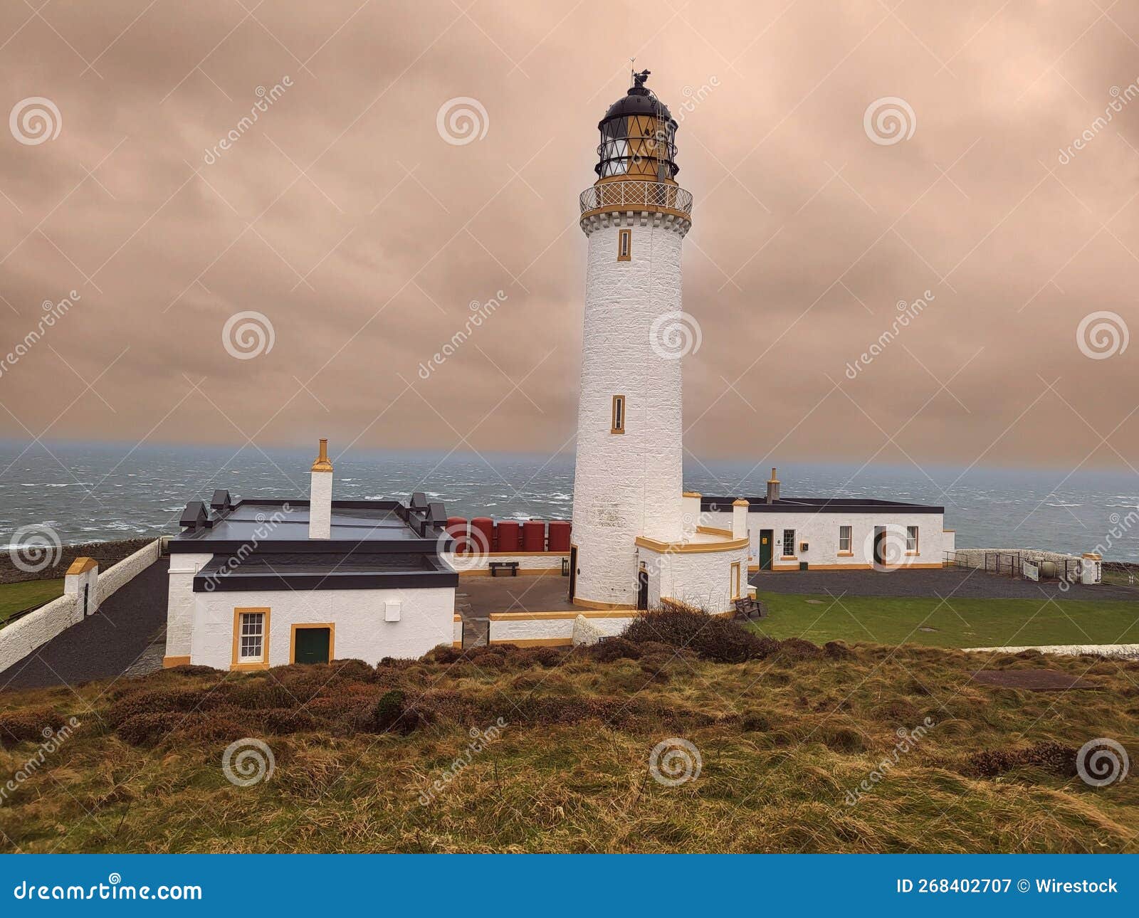 Sunset Sky Over the Old Lighthouse on a Seashore in Scotland, UK Stock ...