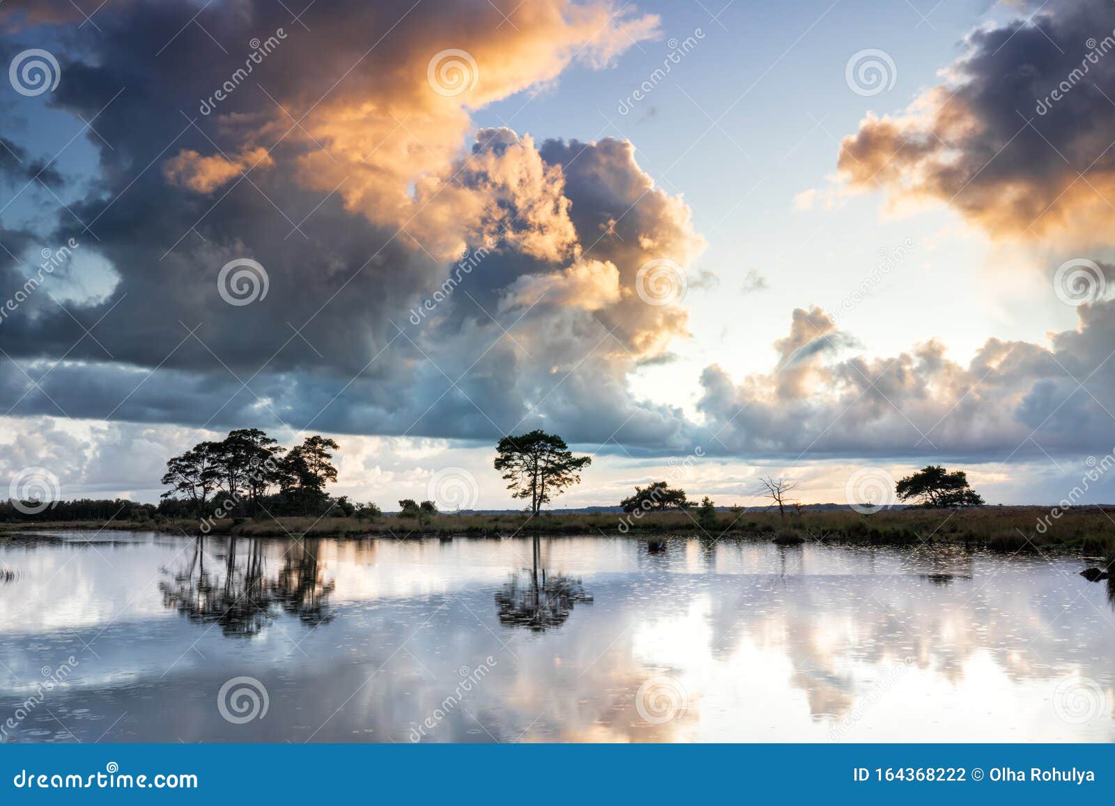 Dramatic Sunset Sky during Rain Stock Photo - Image of gold, pond ...