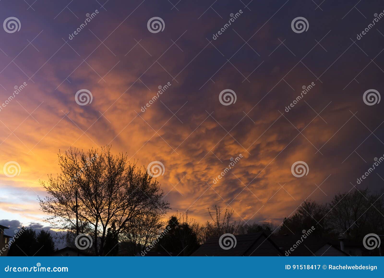 Dramatic Sunset Sky Reflecting Off of Storm Clouds Approaching N Stock ...
