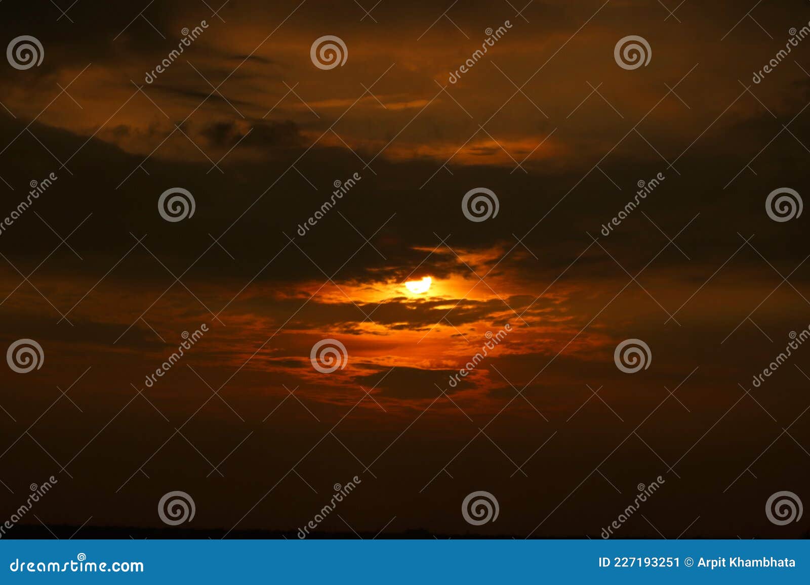 Dramatic View of Sun Hiding in Sky Stock Image - Image of landscape ...