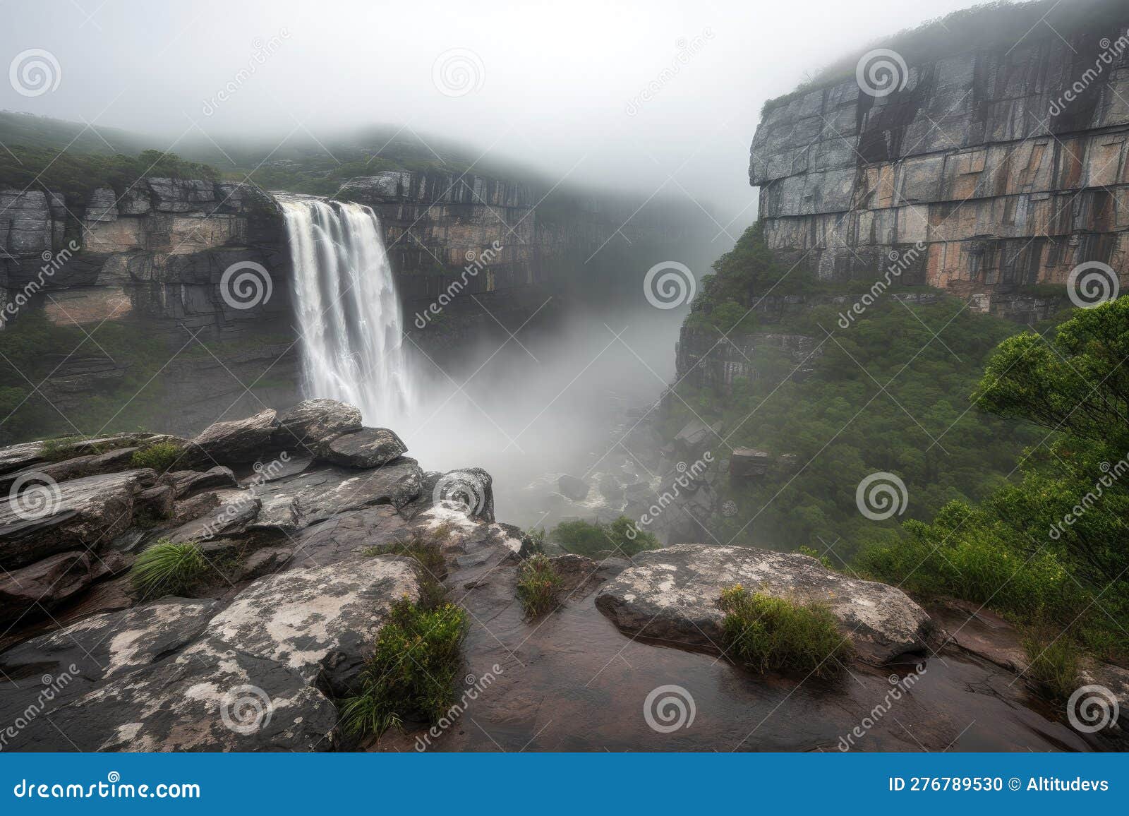 Dramatic Waterfall Scene, with Mist and Clouds Rolling Over the Rocks ...