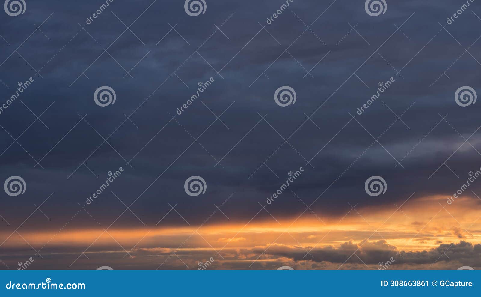 Dramatic Yellow Sunset with Vibrant Clouds Lit by a Sun Stock Image ...
