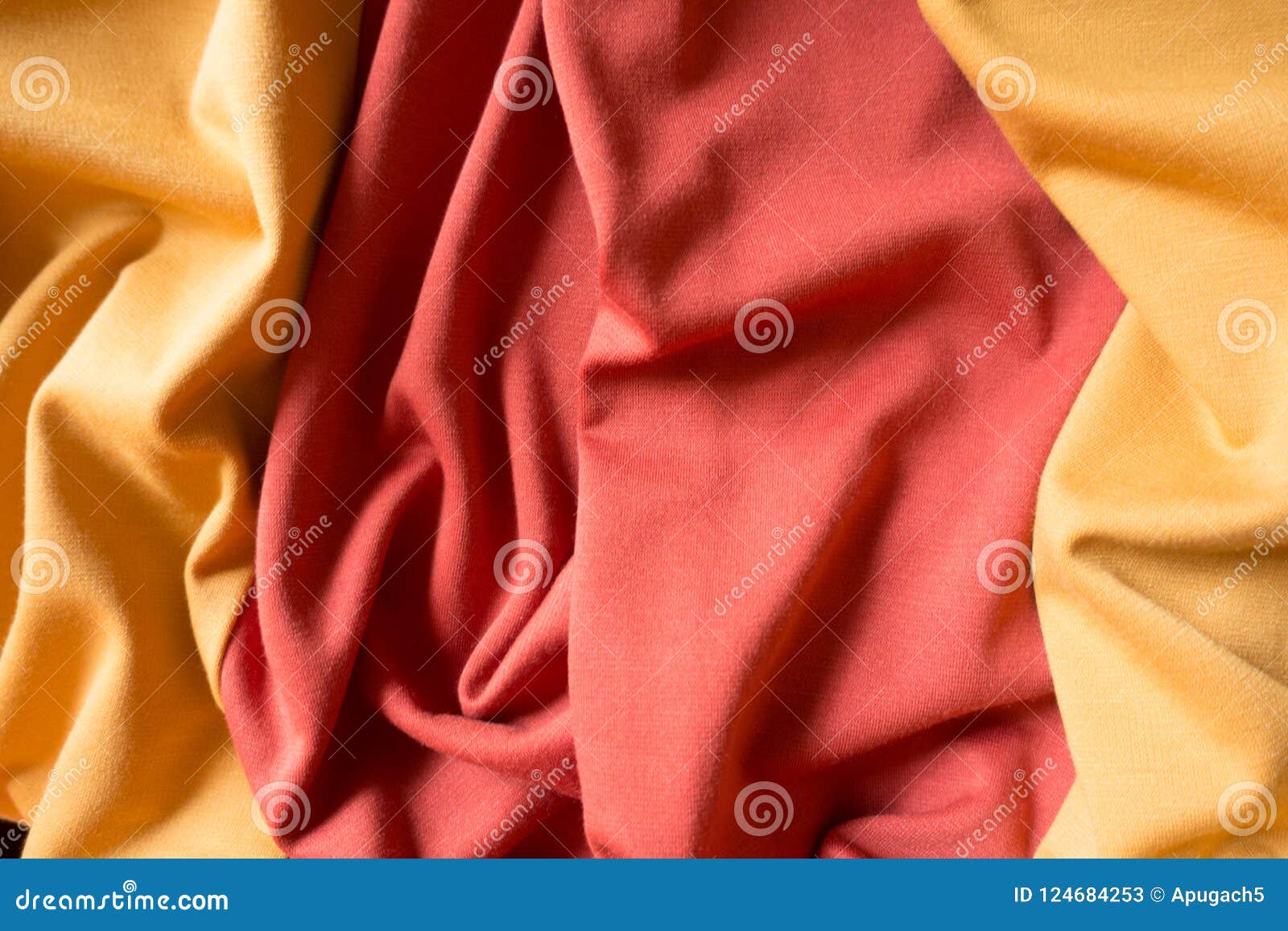 Draped Orange and Red Jersey Fabric Stock Image - Image of soft ...