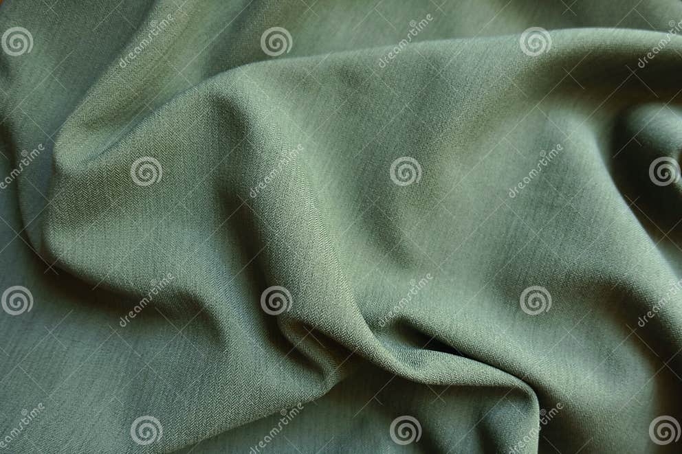Draped Reseda Green Fabric with Herringbone Pattern Stock Photo - Image ...