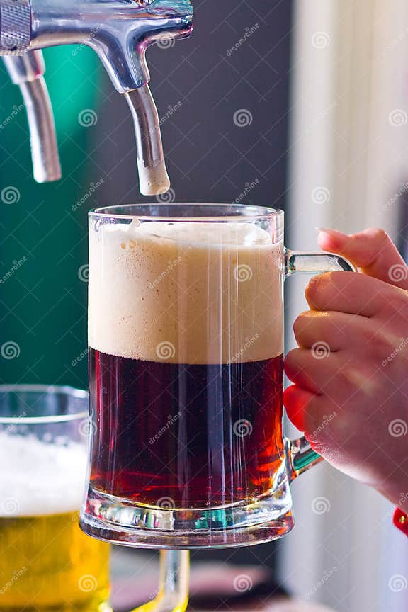 Draught beer stock image. Image of enjoyment, glass, hand - 24454623