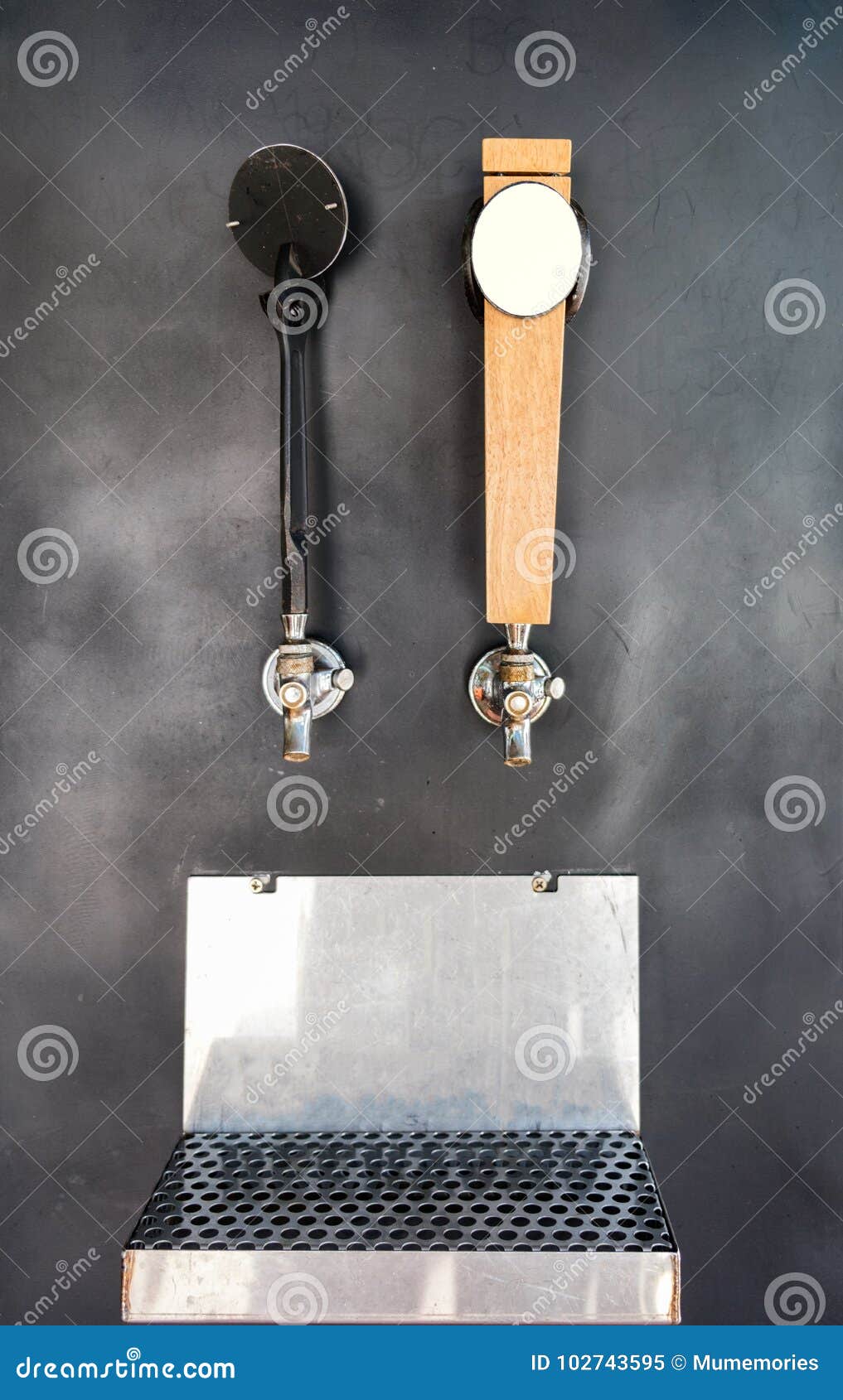 Draught beer tabs on bar stock image. Image of brewery - 102743595