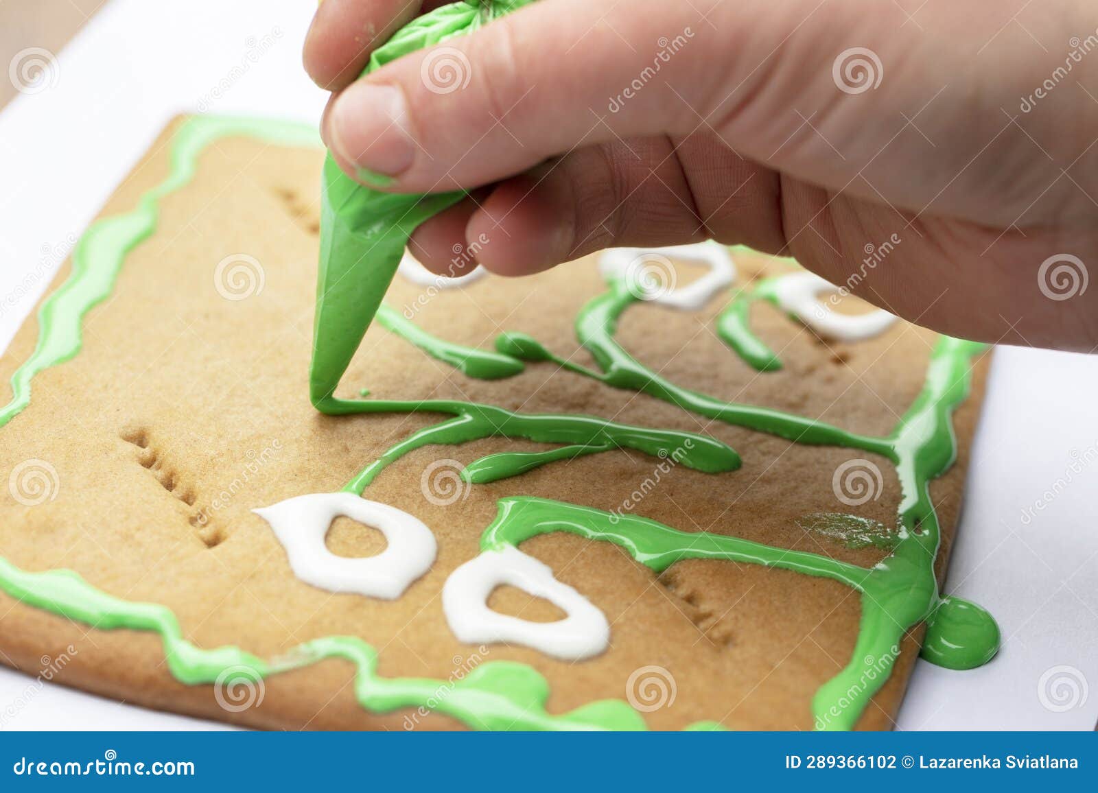 Draw with Cream Icing on a Gingerbread Stock Photo - Image of class ...