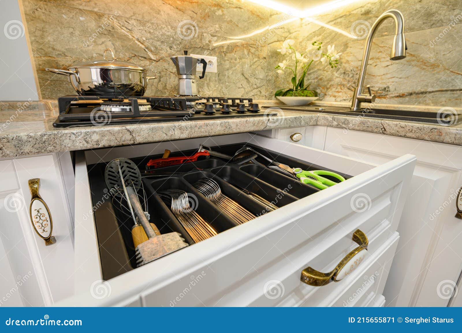 Drawers Pulled Out at Modern Classic White Kitchen Furniture Stock ...