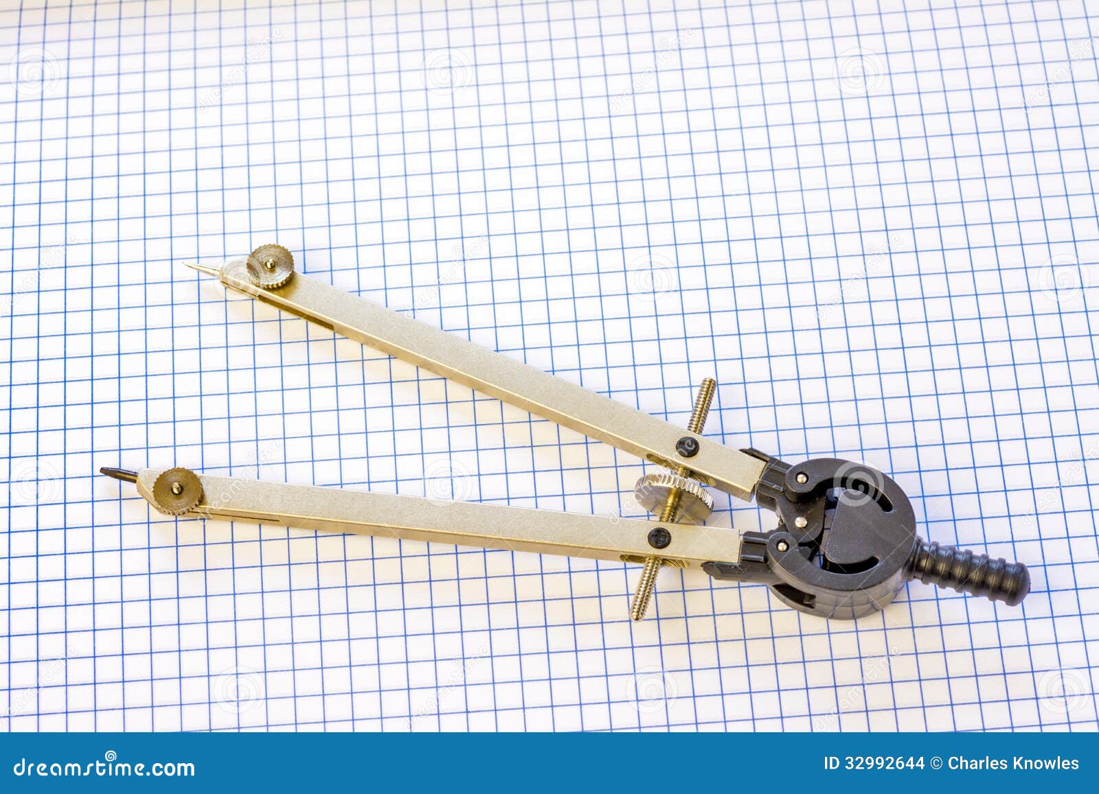 Drawing Compass in Graph Paper Stock Photo - Image of office, tools ...