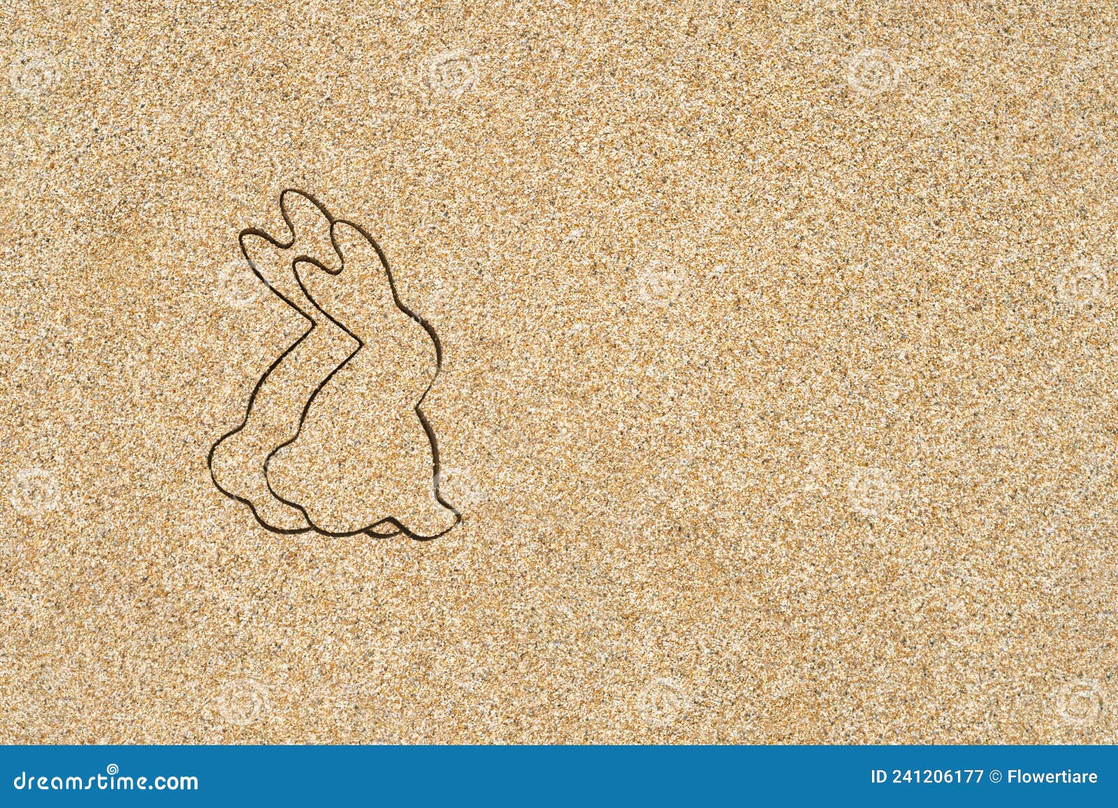 Drawing Creative Two Easter Bunny on the Sand on the Beach. Stock Image ...
