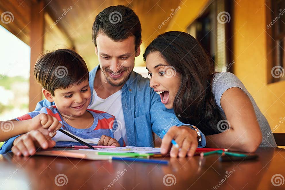 Drawing, Excited and Homework with Family at Table for Education ...