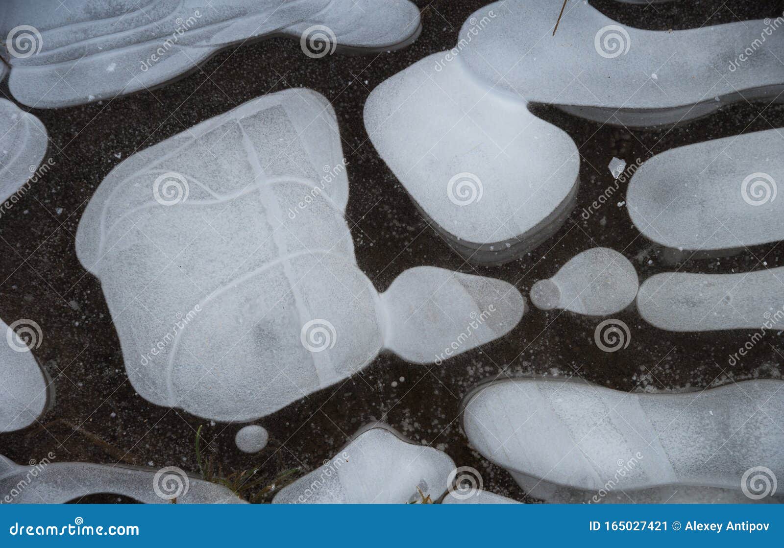 Drawing on Ice Puddles in Late Autumn Stock Image - Image of frozen ...