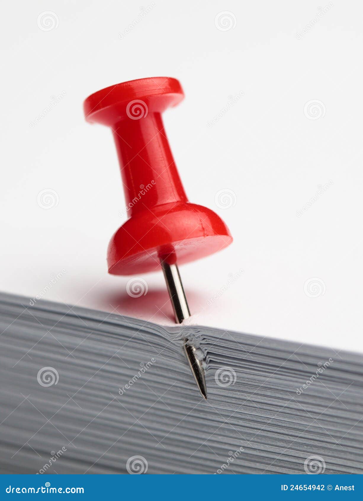 Drawing pin in paper pile stock photo. Image of pile - 24654942