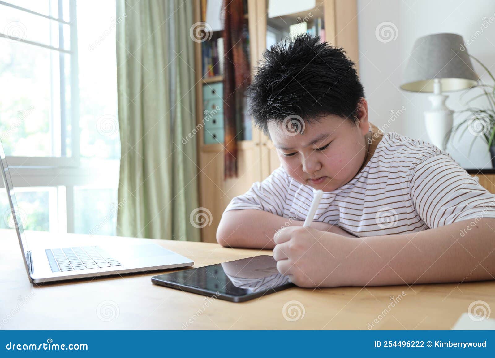 Drawing on Tablet stock photo. Image of concentration - 254496222