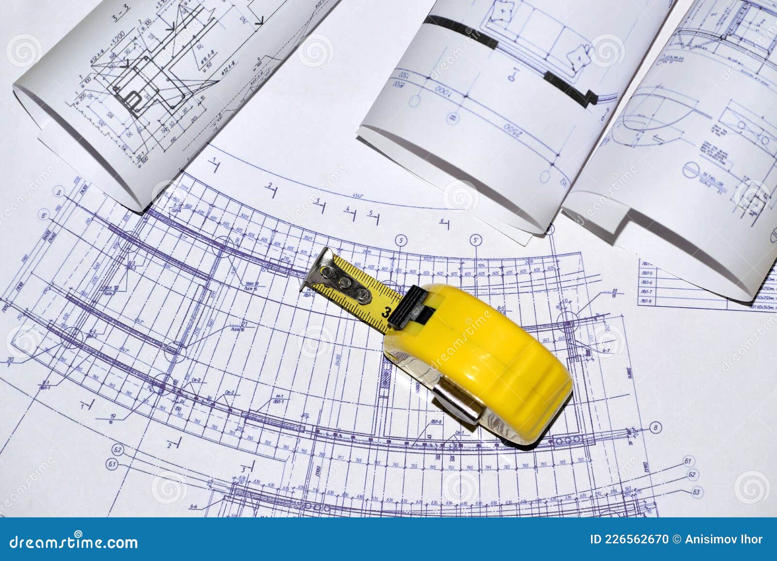 Drawings and Blueprints with Tape Measure Tool are Laid Out Throughout ...
