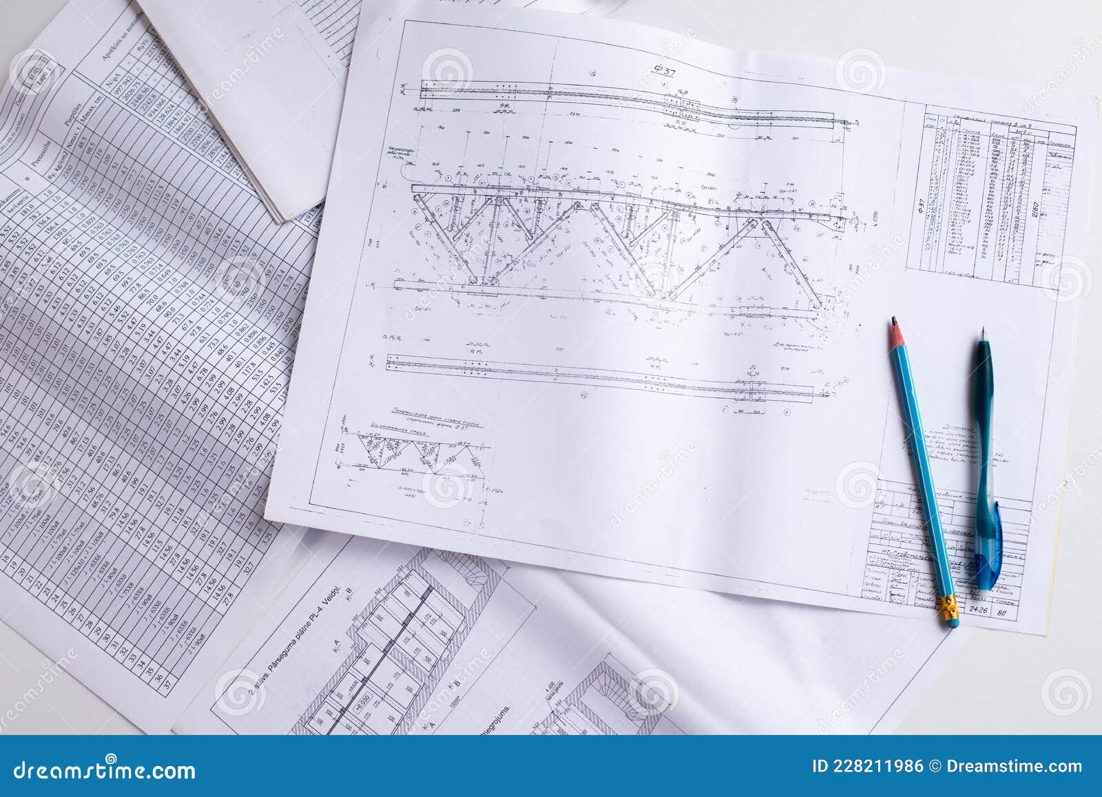 Drawings of a Construction Engineer on a Sheet of Paper Stock Photo ...