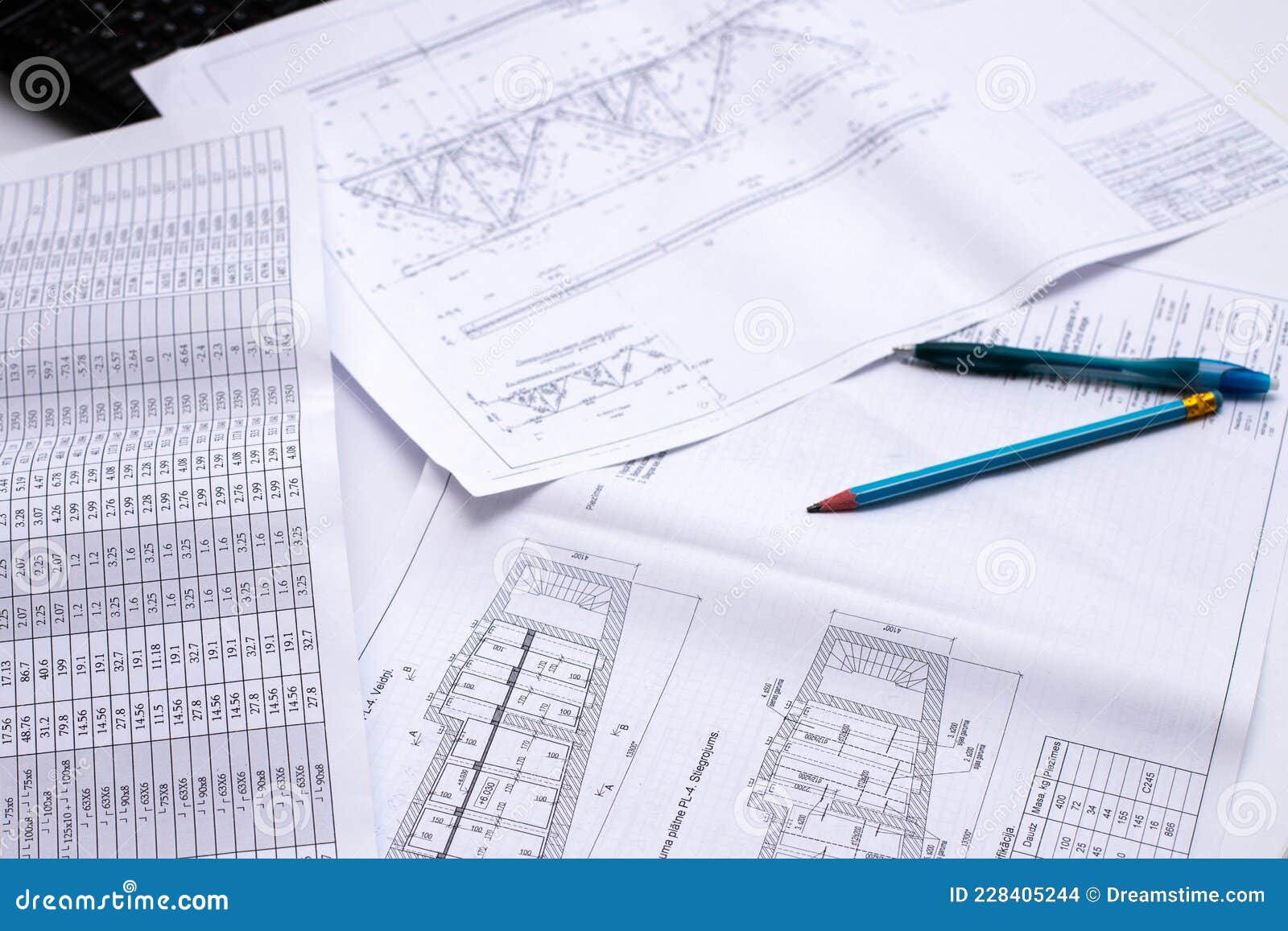 Drawings of a Construction Engineer on a Sheet of Paper Stock Photo ...