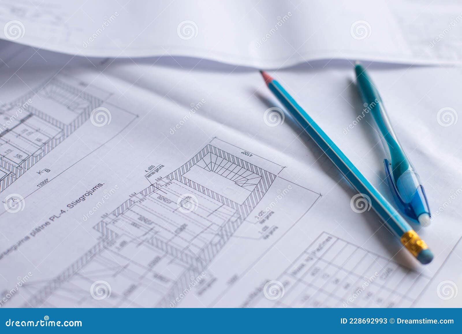 Drawings of a Construction Engineer on a Sheet of Paper Stock Image ...