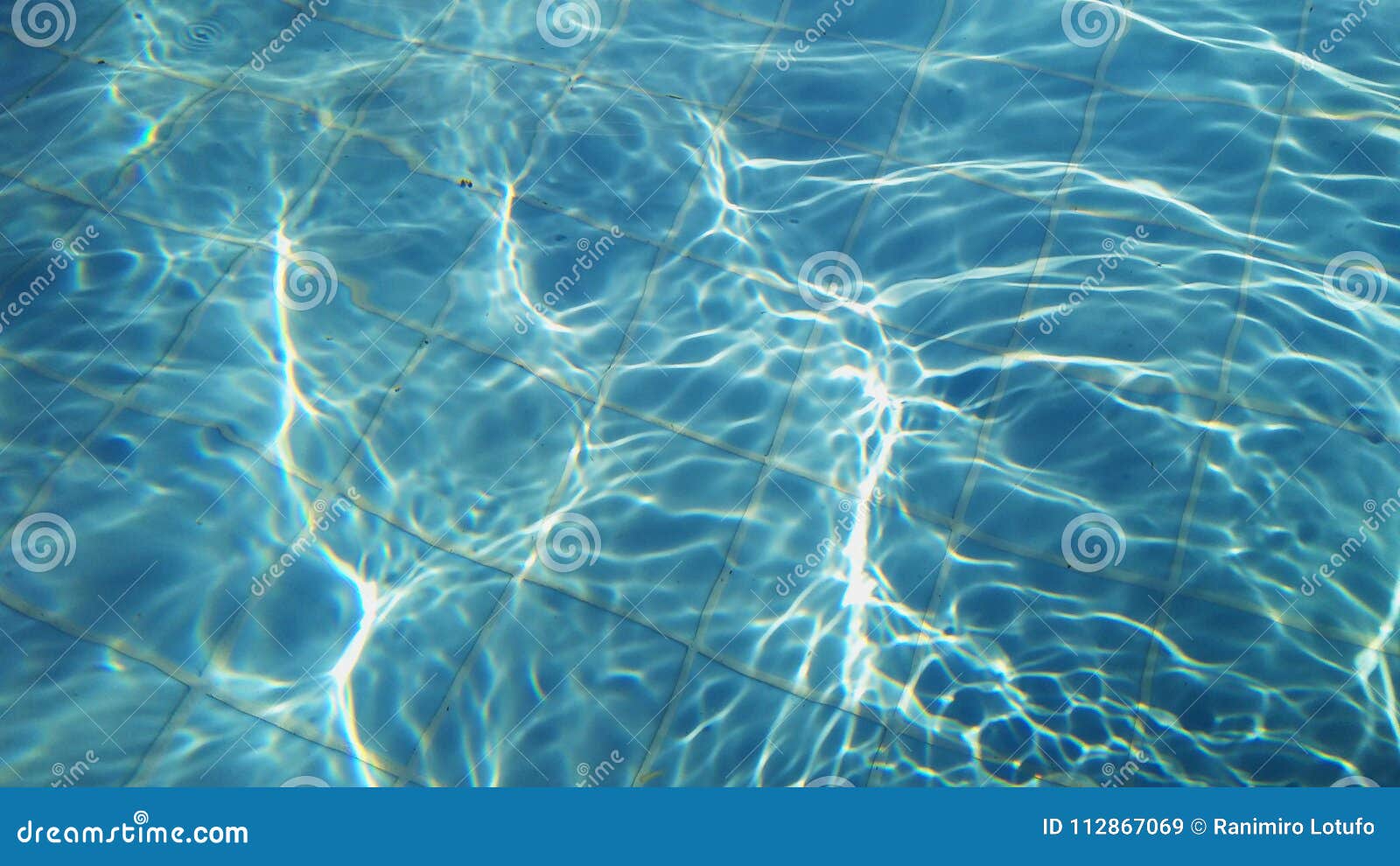 Drawings on the Wave of Water in Blue Swimming Pool Stock Image - Image ...