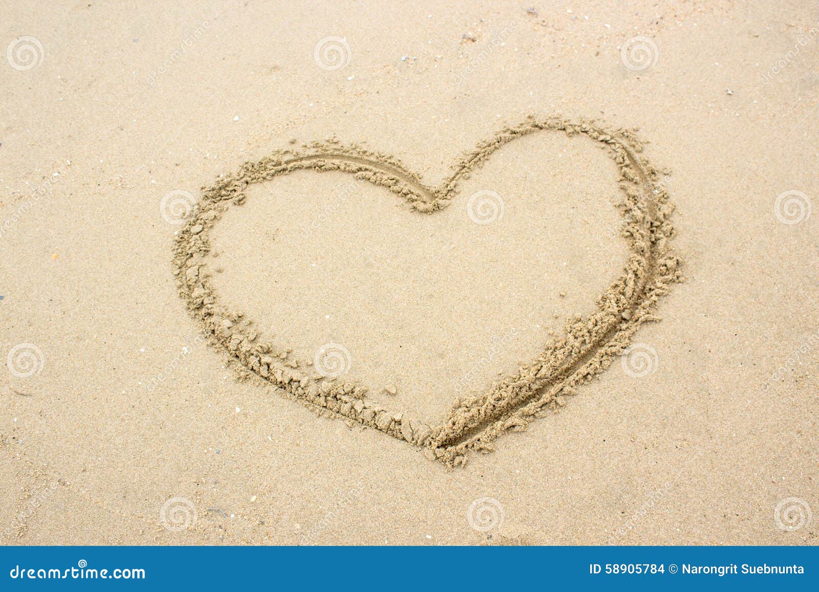Drawn heart shape on sand stock photo. Image of abstract - 58905784
