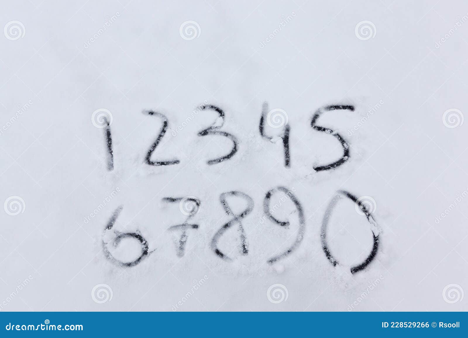 Drawn numbers on the snow stock photo. Image of inspiration - 228529266