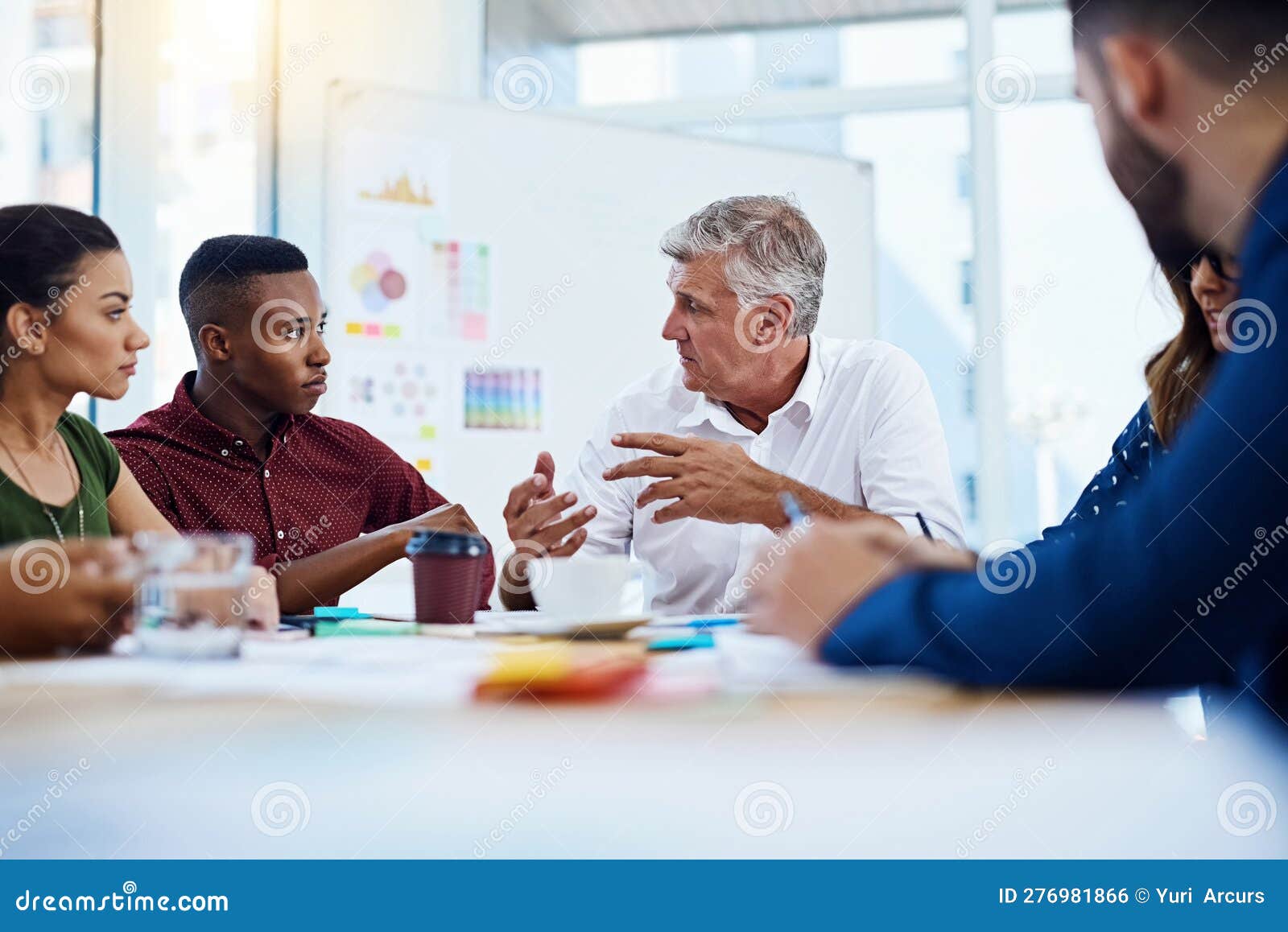 The Dream Makes the Team Work. a Group of Creative Employees Working in ...