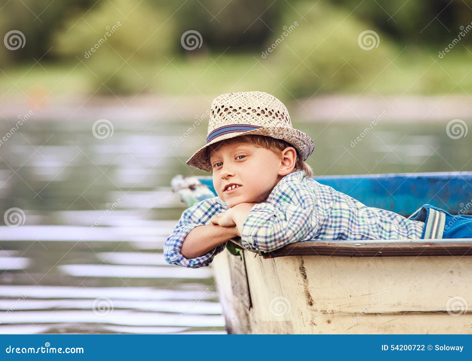 Dreaming Boy Lying in Old Boat on the River Stock Photo - Image of ...