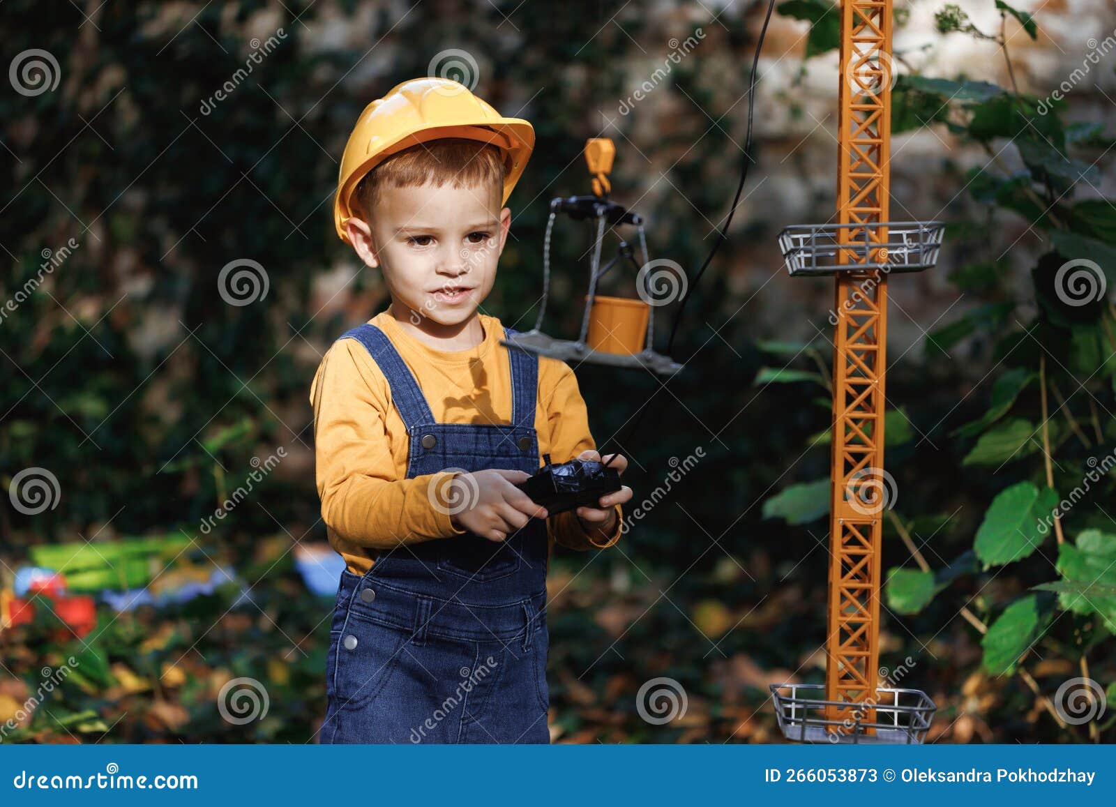 Dreaming of Future Profession. Little Boy Builder in Uniform Working on ...