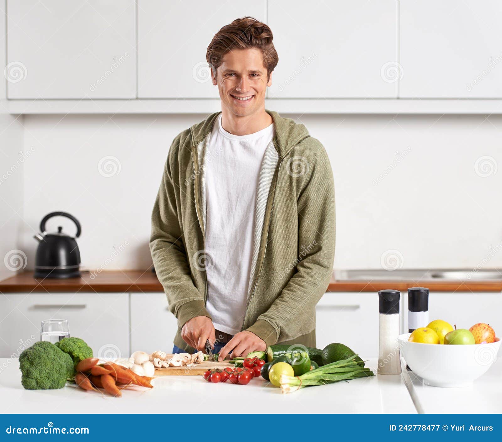 He Dreams of Becoming a Chef. Portrait of a Young Man Preparing Dinner ...